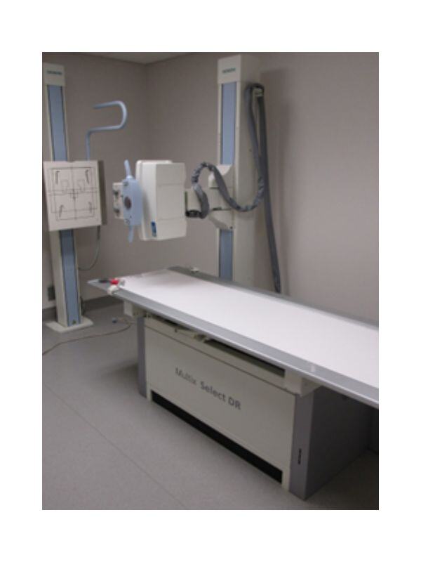 What size room do I need for a fixed X-ray system?
